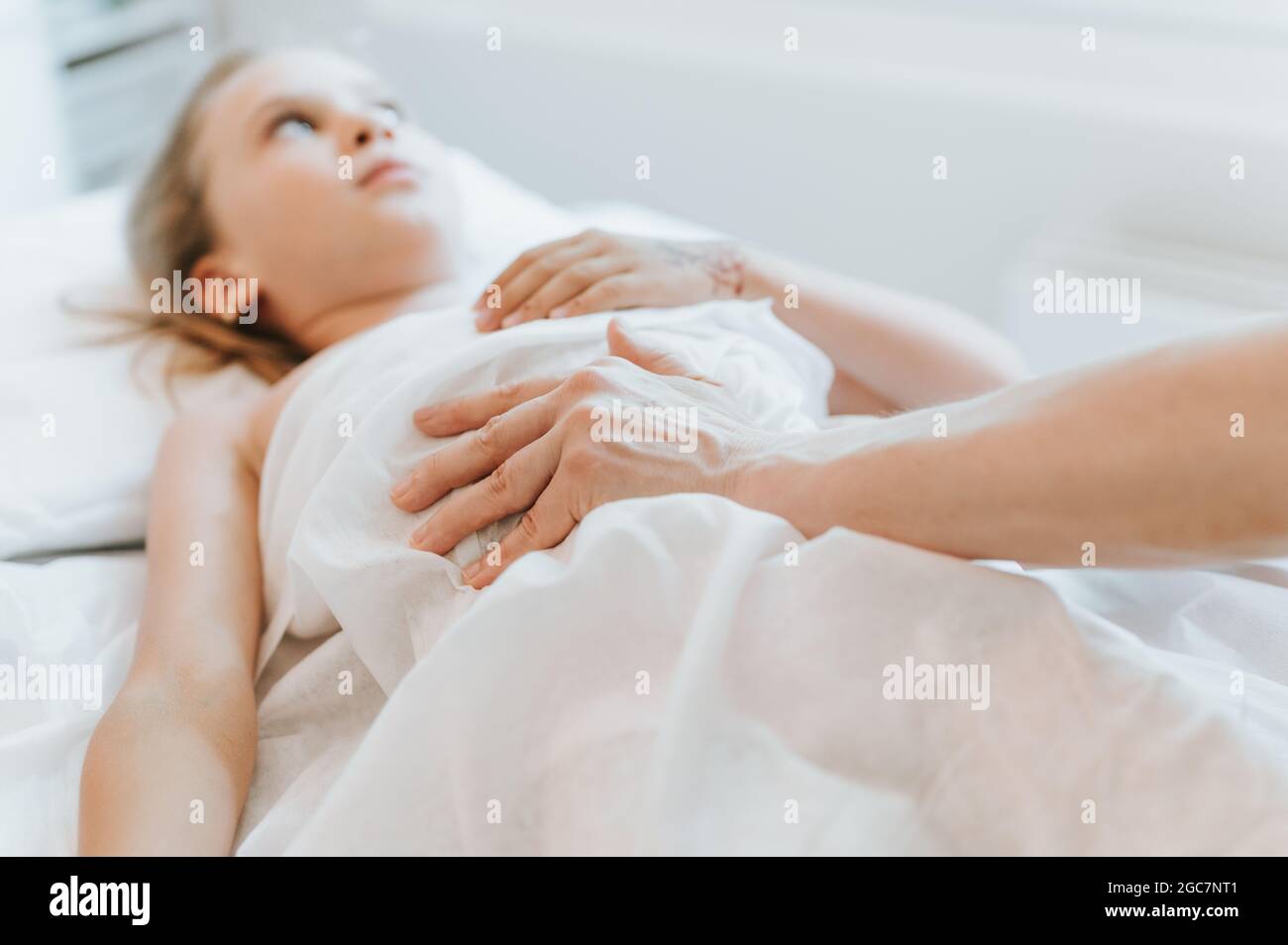 real doctor osteopath hands does physiological and emotional therapy ...