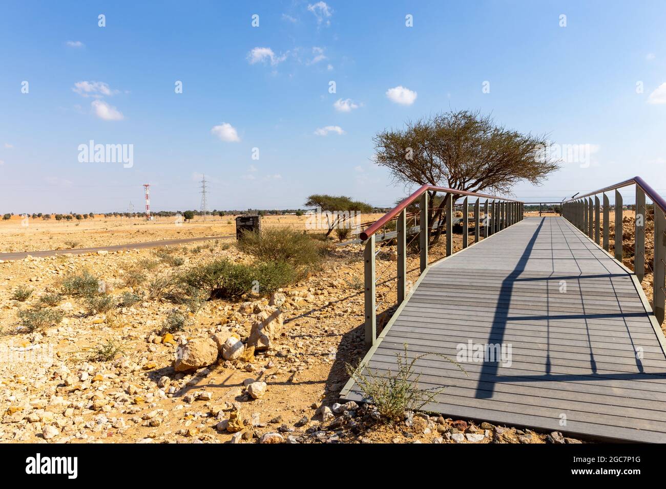Wooden walking platform in Valley of the Caves in Mleiha Archaeological ...
