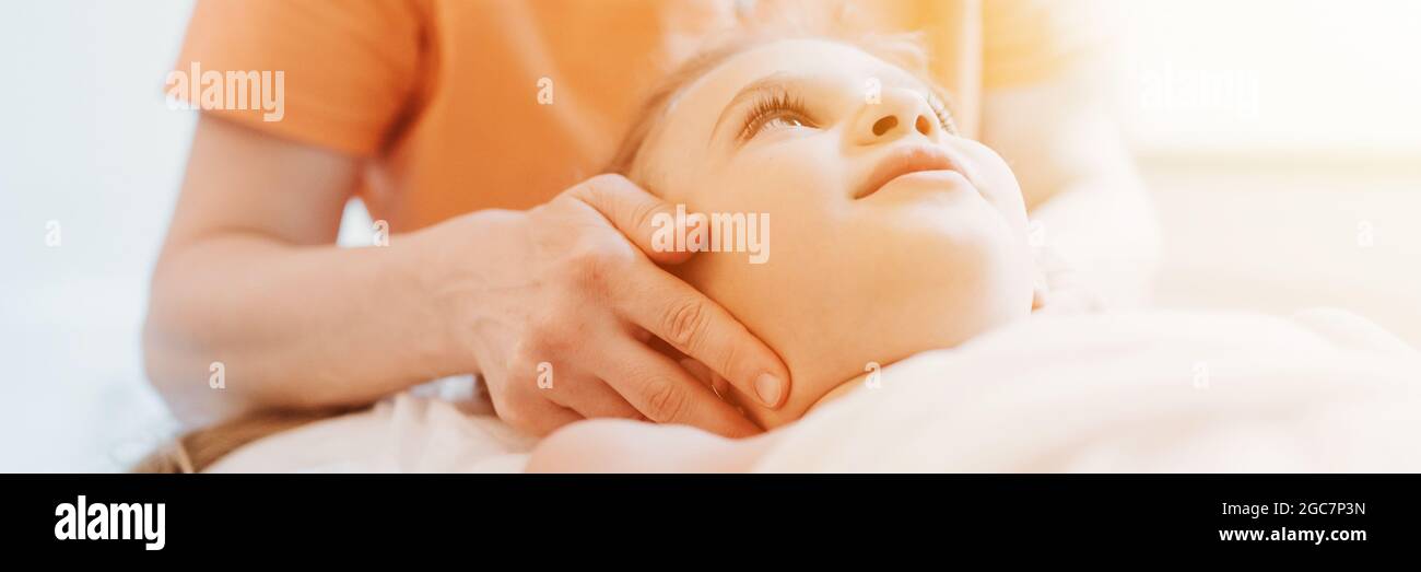 real doctor osteopath hands does physiological therapy for eight year ...