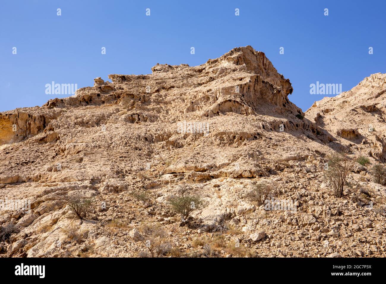 Dry, arid limestone mountains in the Valley of the Caves in Mleiha ...