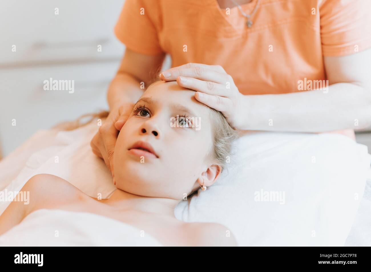 real doctor osteopath hands does physiological and emotional therapy ...