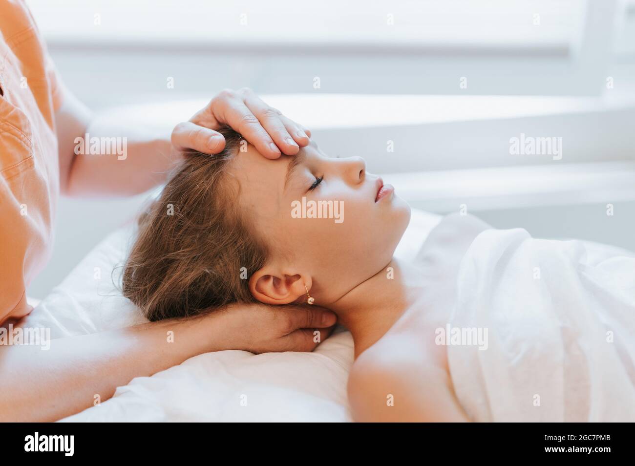 real doctor osteopath hands does physiological and emotional therapy ...