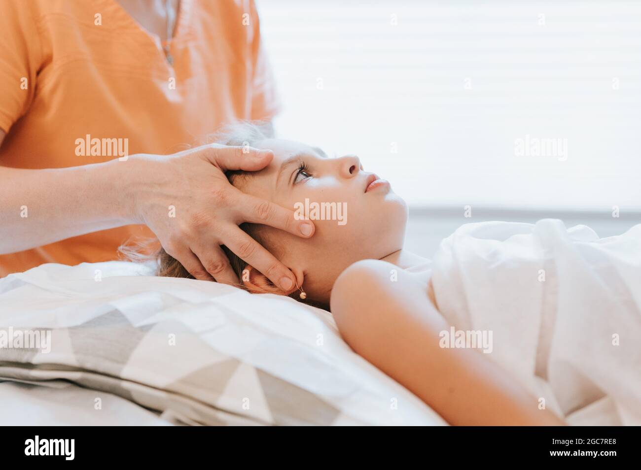 real doctor osteopath hands does physiological and emotional therapy ...