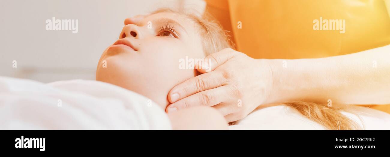 real doctor osteopath hands does physiological therapy for eight year ...