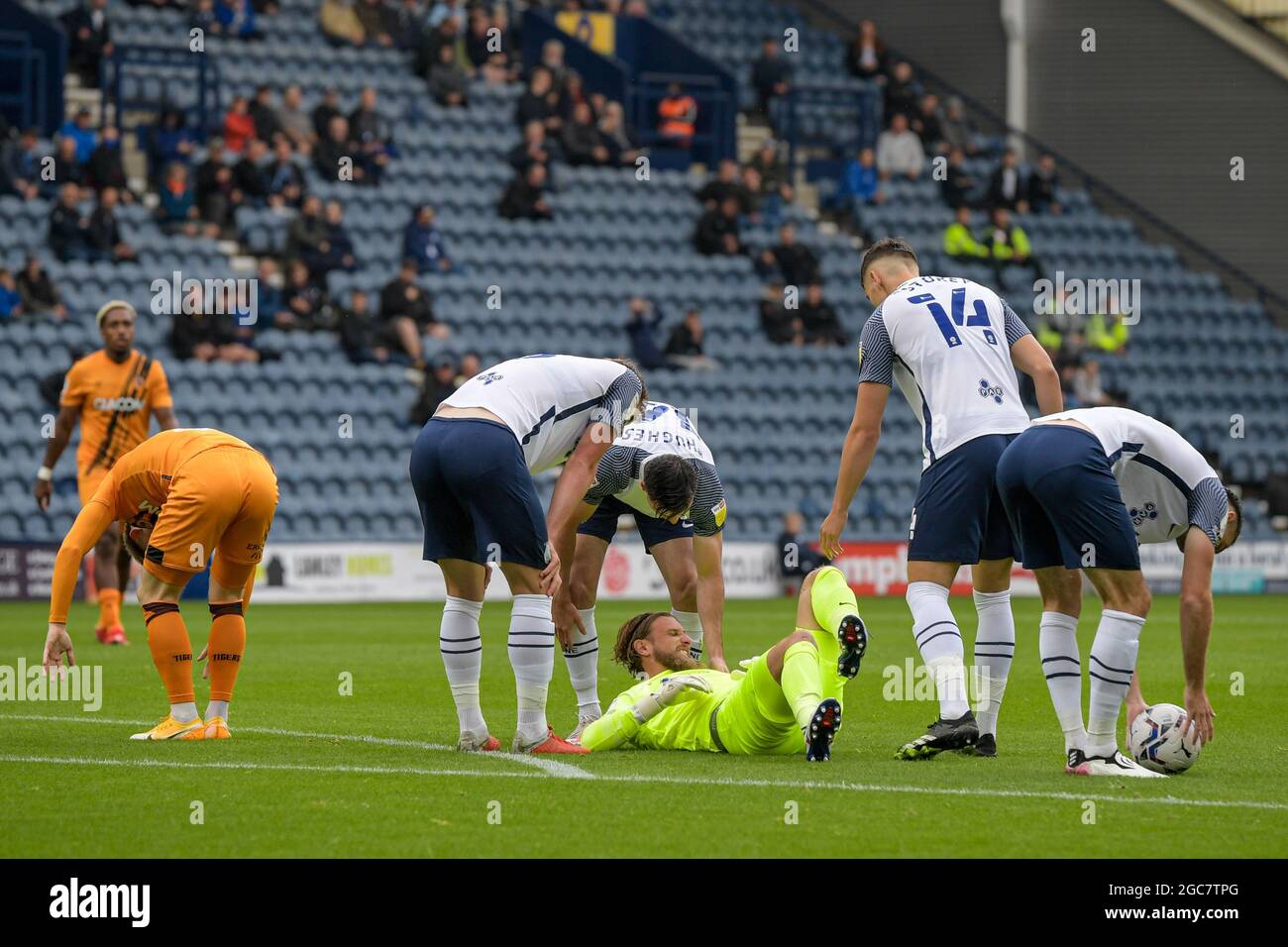 Declan Rudd #1 of Preston North End goes down after a collision with ...