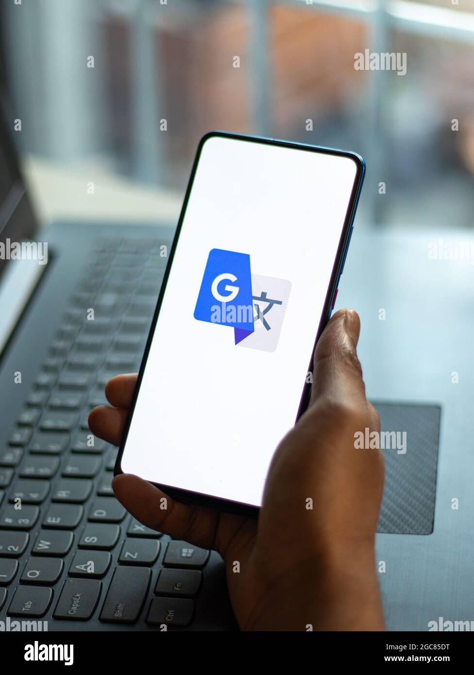 Assam, India - August 6, 2021 : Google translate logo on phone screen ...