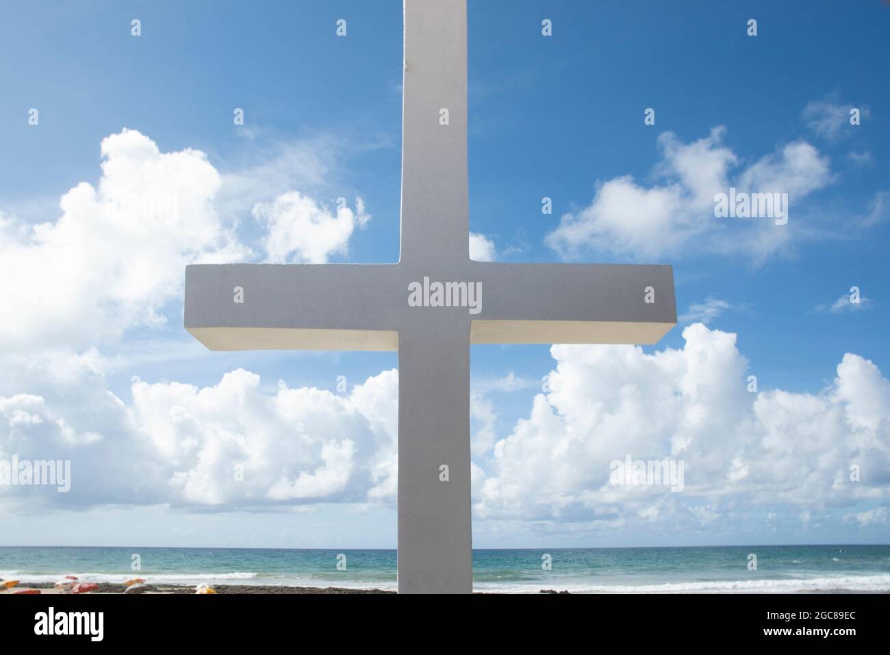Catholic cross in the blue sky. Protection for fishermen in the Boca do ...