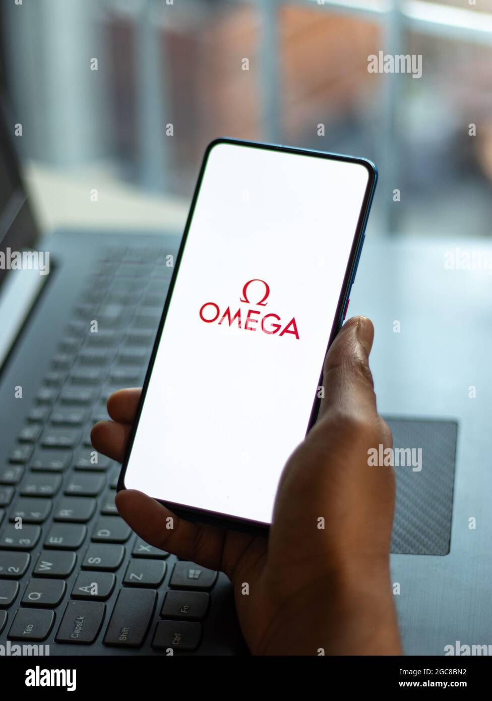 Omega watch company logo hi-res stock photography and images - Alamy