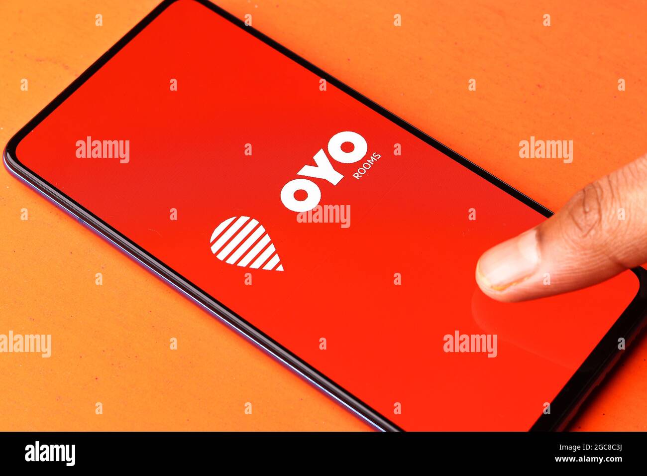 Assam, India - August 6, 2021 : Oyo logo on phone screen stock image ...
