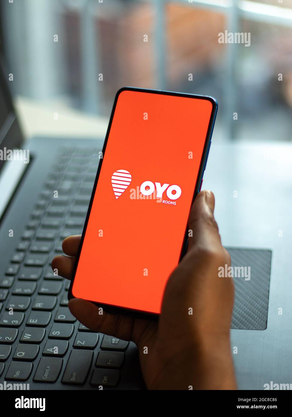 Assam, India - August 6, 2021 : Oyo logo on phone screen stock image ...