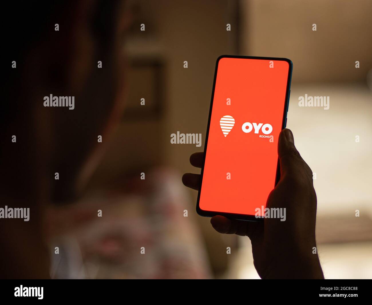 Assam, India - August 6, 2021 : Oyo logo on phone screen stock image ...