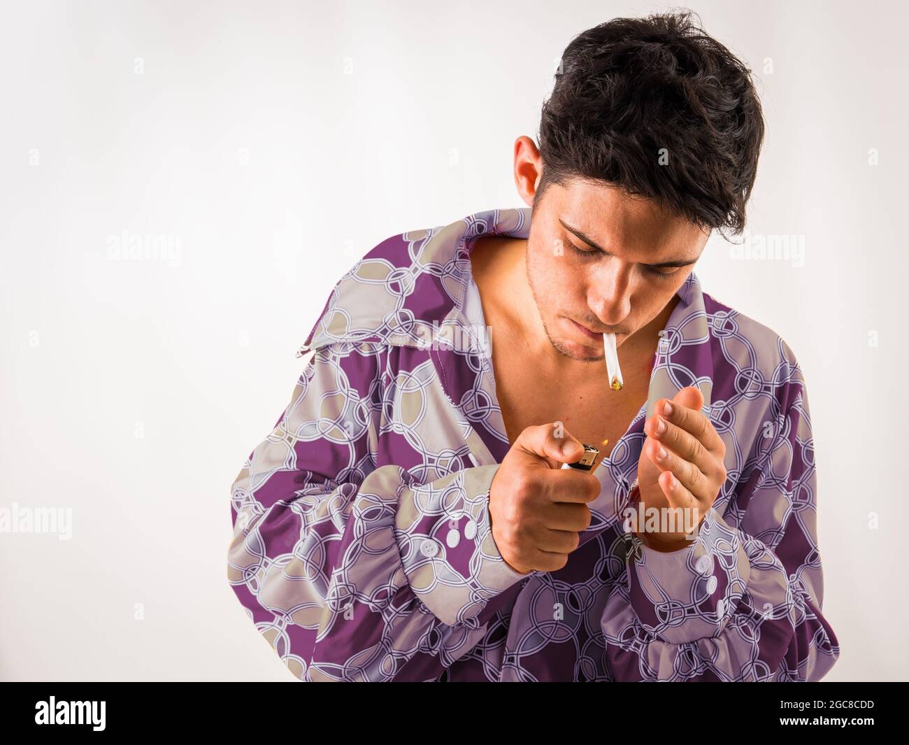 1970s man with cigarette hi-res stock photography and images - Alamy