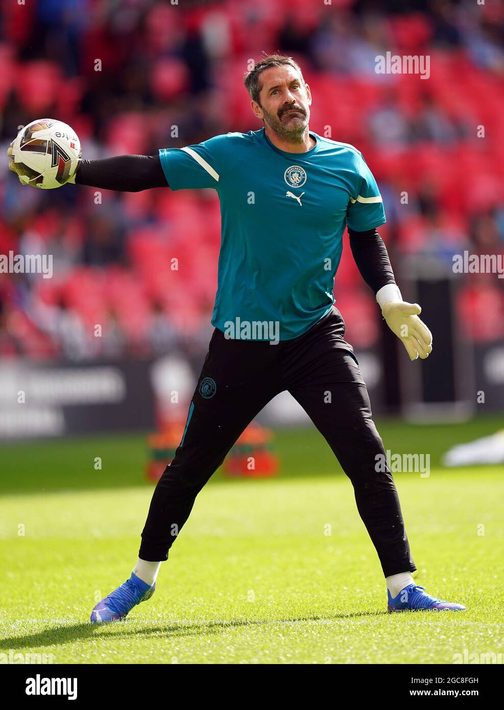 Manchester City goalkeeper Scott Carson warms up before the FA ...