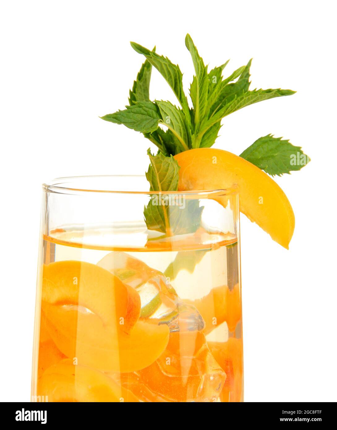 Glass of fruit drink with ice cubes isolated on white Stock Photo - Alamy