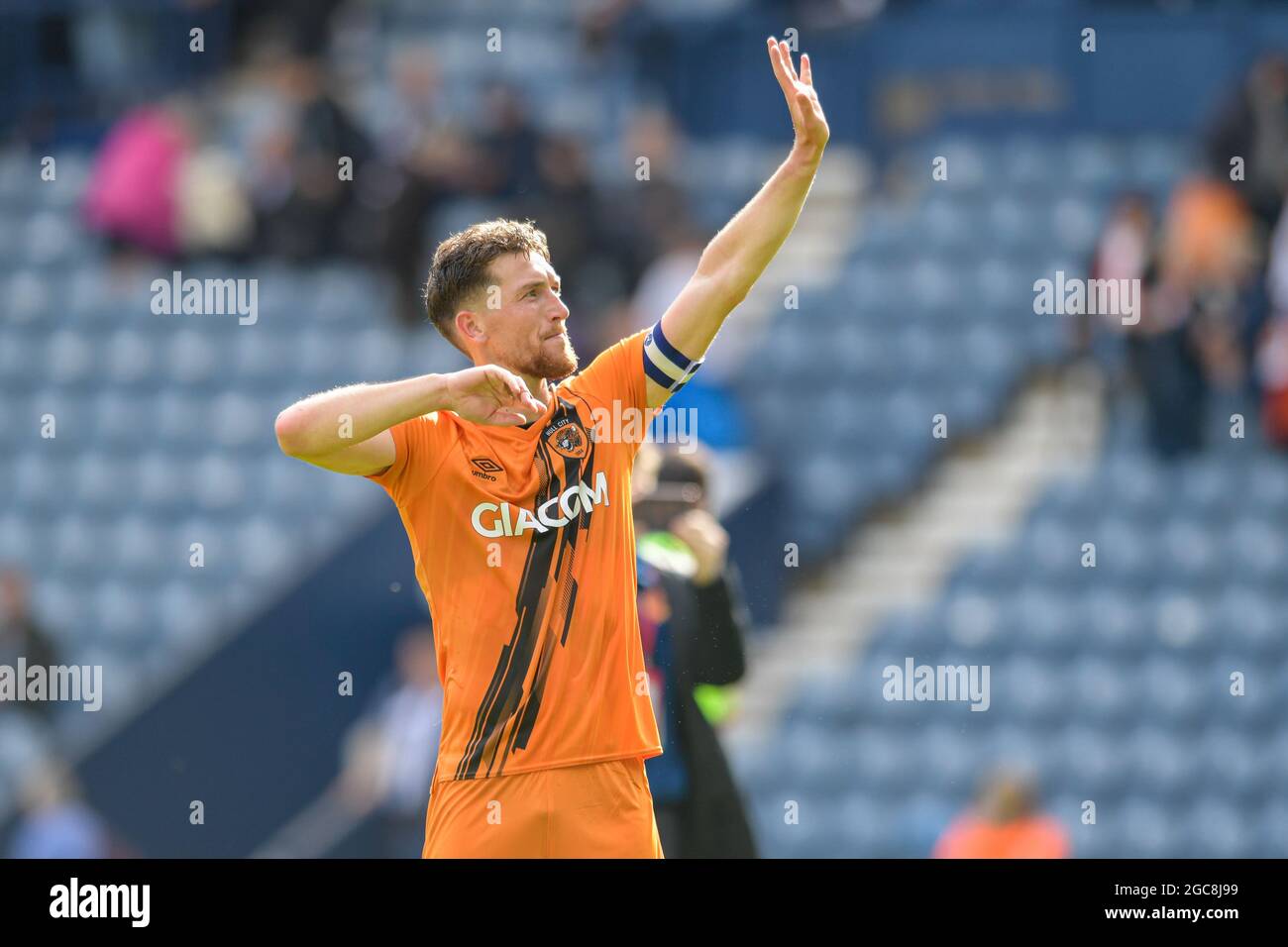 Richard Smallwood #6 of Hull City waves to the travelling supporters ...