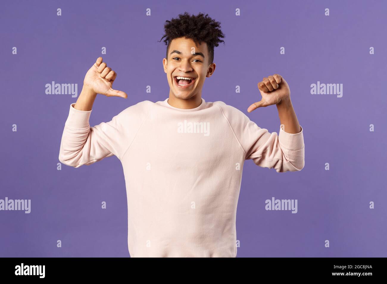 Portrait of confident young upbeat man, smiling bragging, being ...