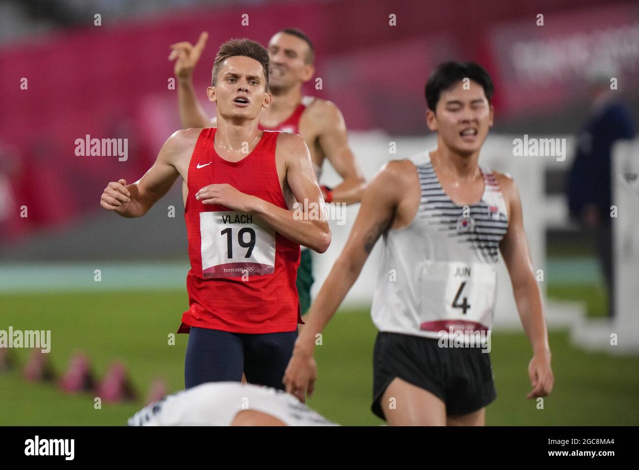 Czech athlete Martin Vlach, left, attends laser run shooting portion of ...