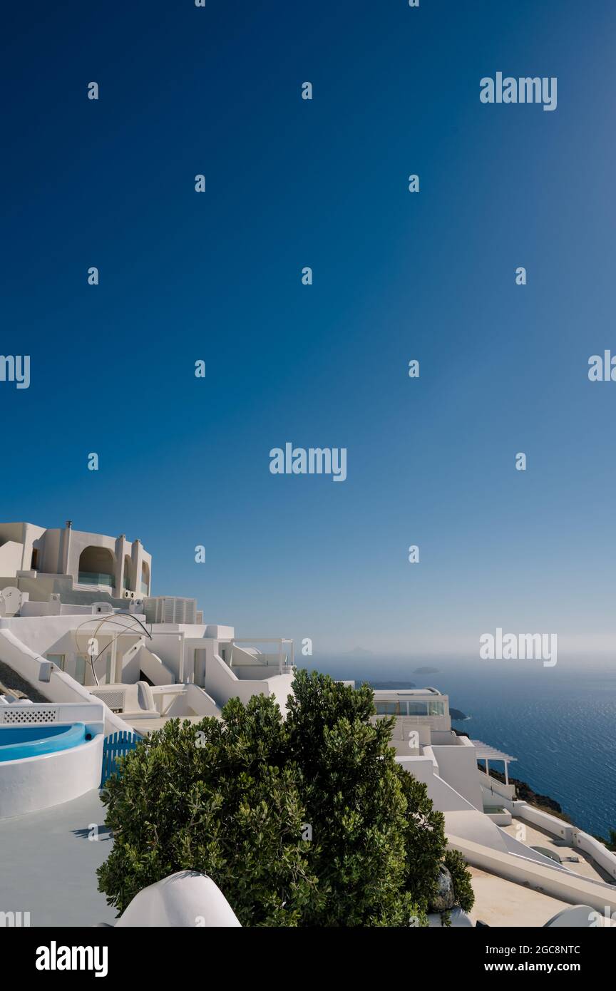 View of caldera and white architecture of Imerovigli on Santorini ...