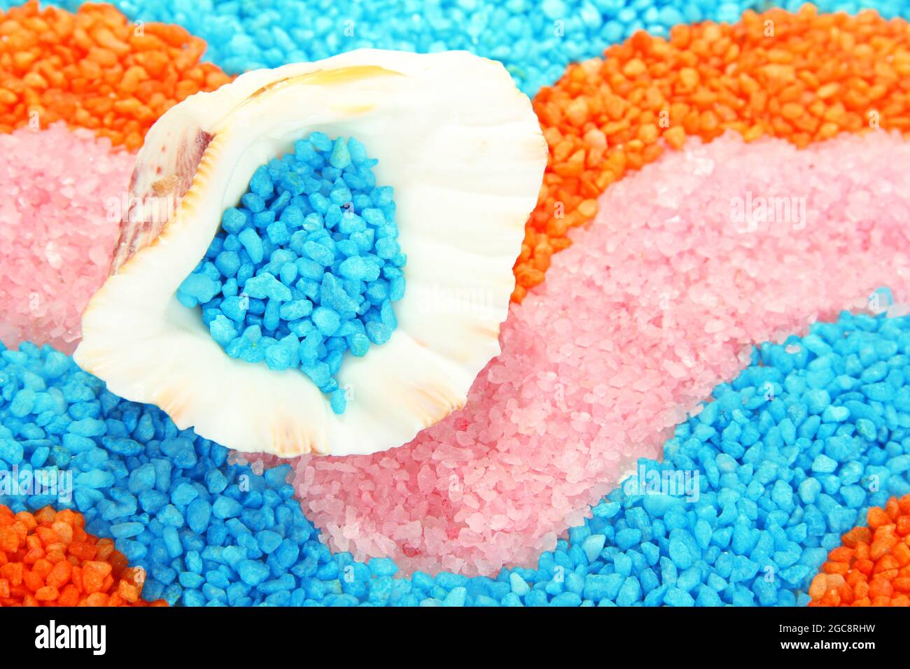 Shell on colorful crystals of sea salt background Stock Photo - Alamy