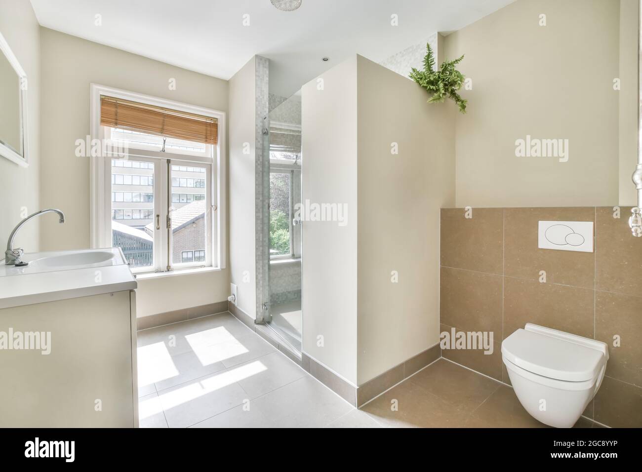 Interior of small clean washroom in miniature style Stock Photo - Alamy