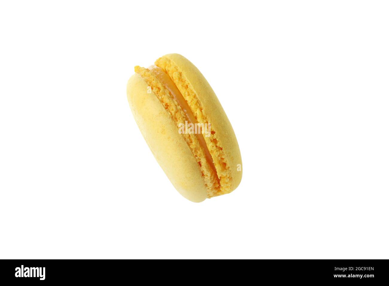 Yellow tasty macaroon isolated on white background Stock Photo - Alamy