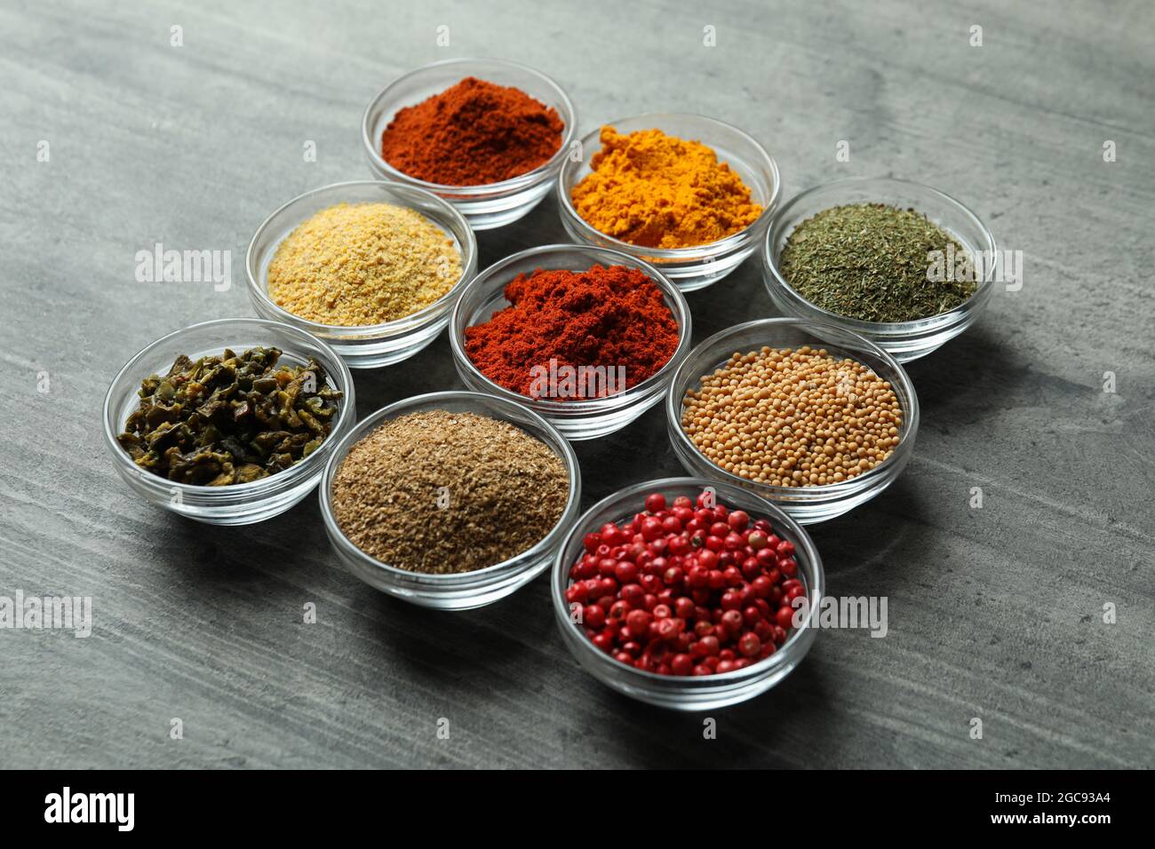 Set of different spices in glass bowls Stock Photo - Alamy