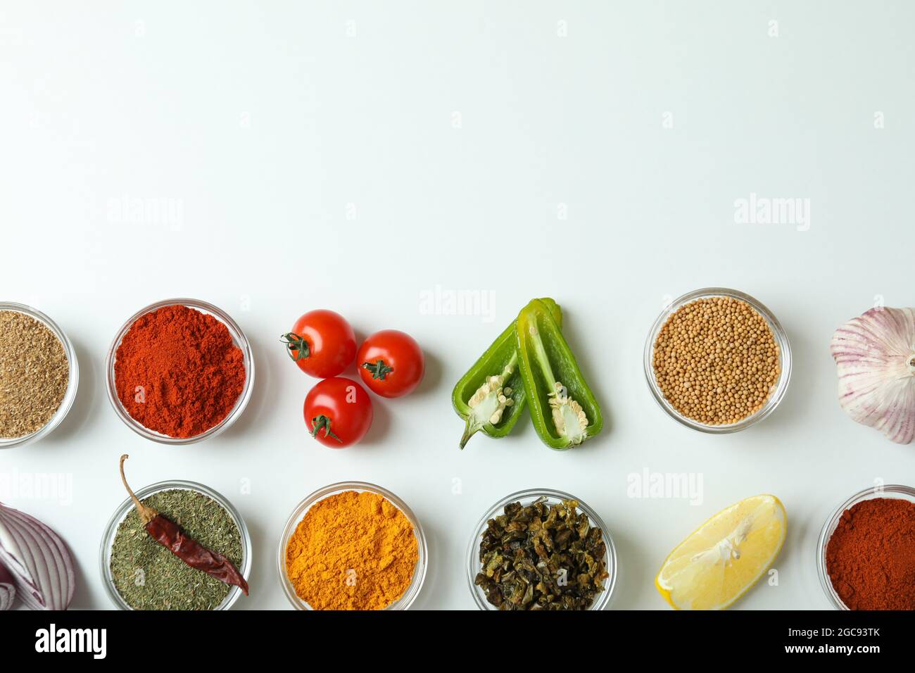 Concept of aromatic spices on white background Stock Photo - Alamy