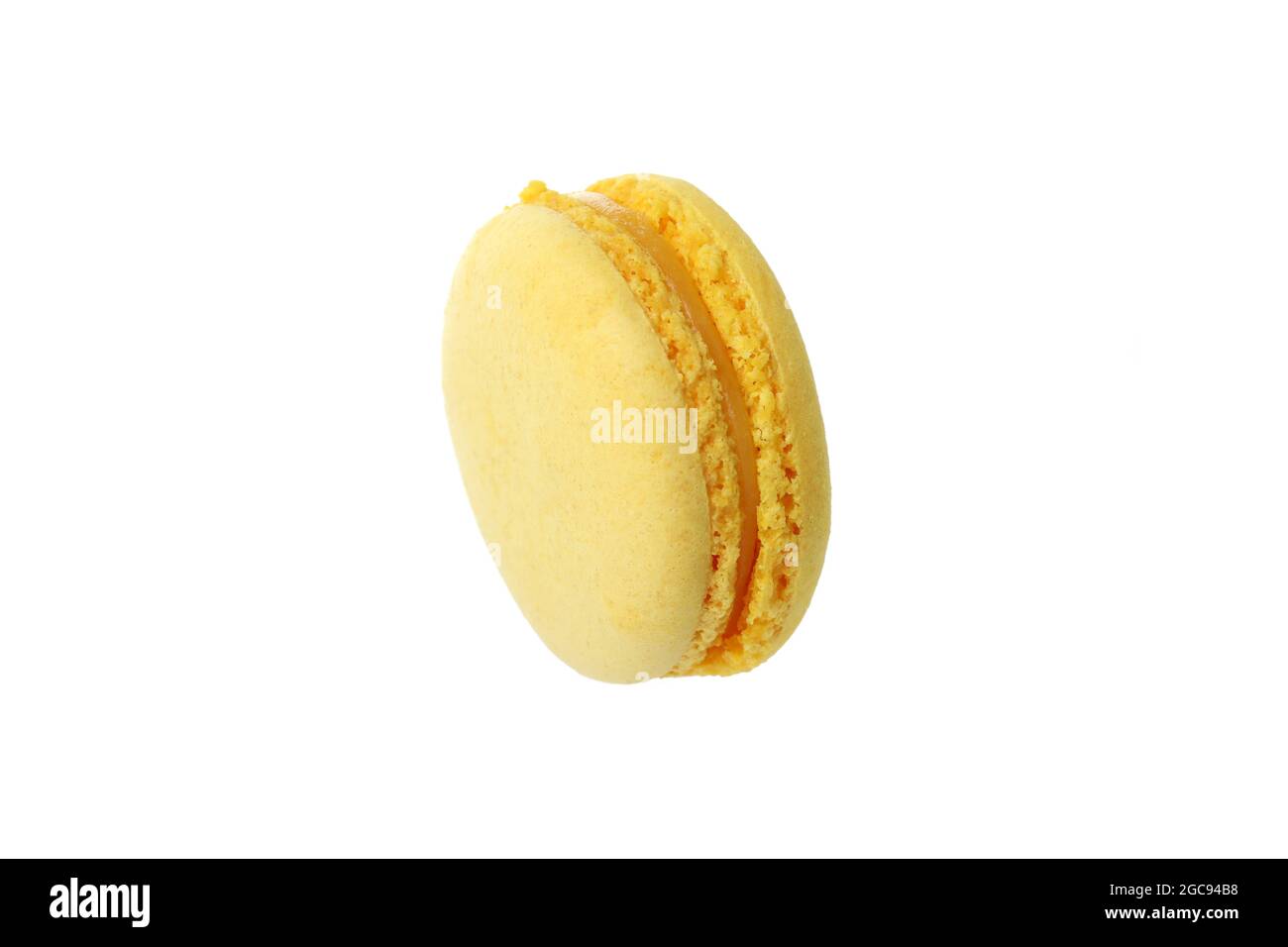 Yellow tasty macaroon isolated on white background Stock Photo - Alamy