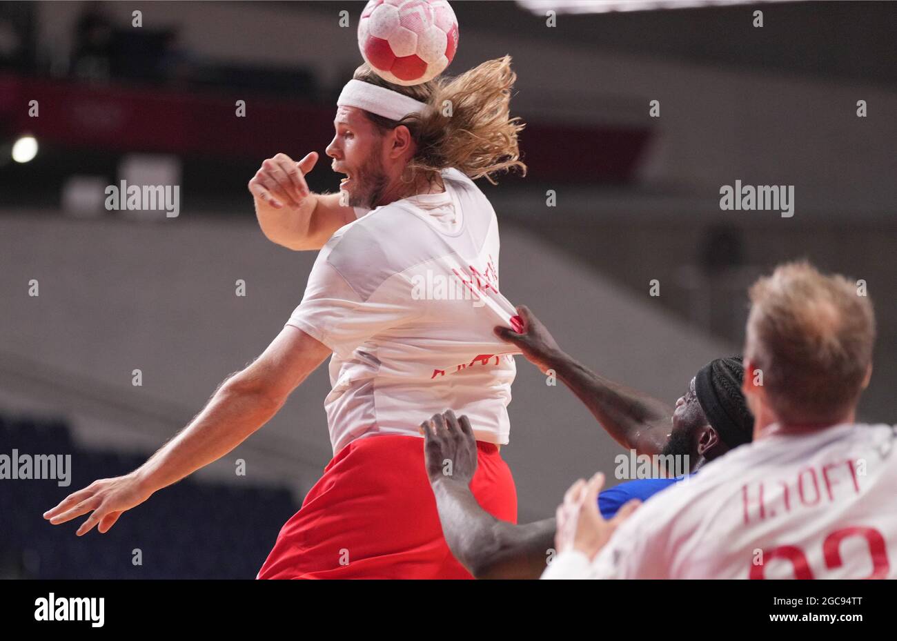 Tokyo, Japan. 7th Aug, 2021. Denmark's Mikkel Hansen (L) competes ...