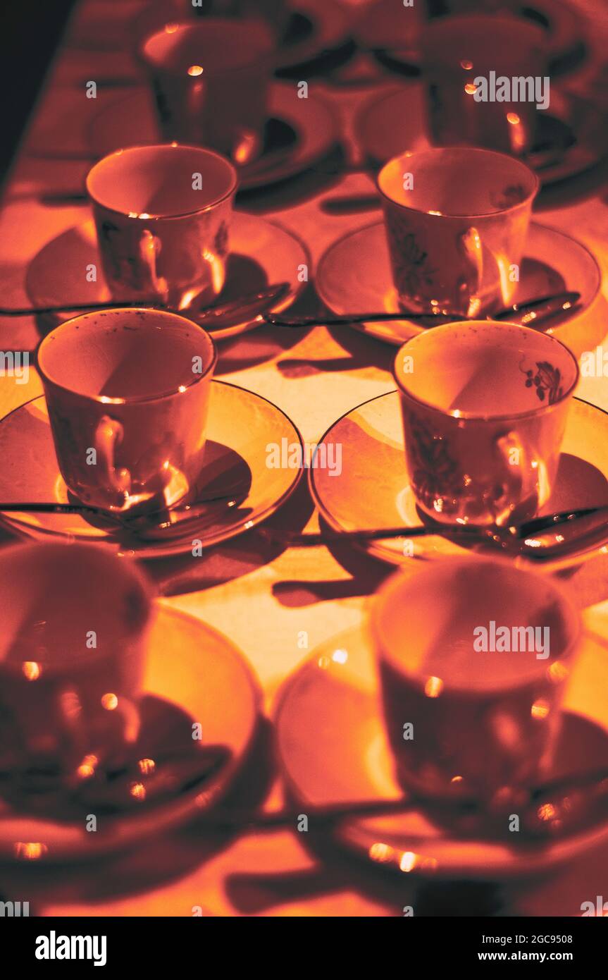 Table with cups Stock Photo - Alamy