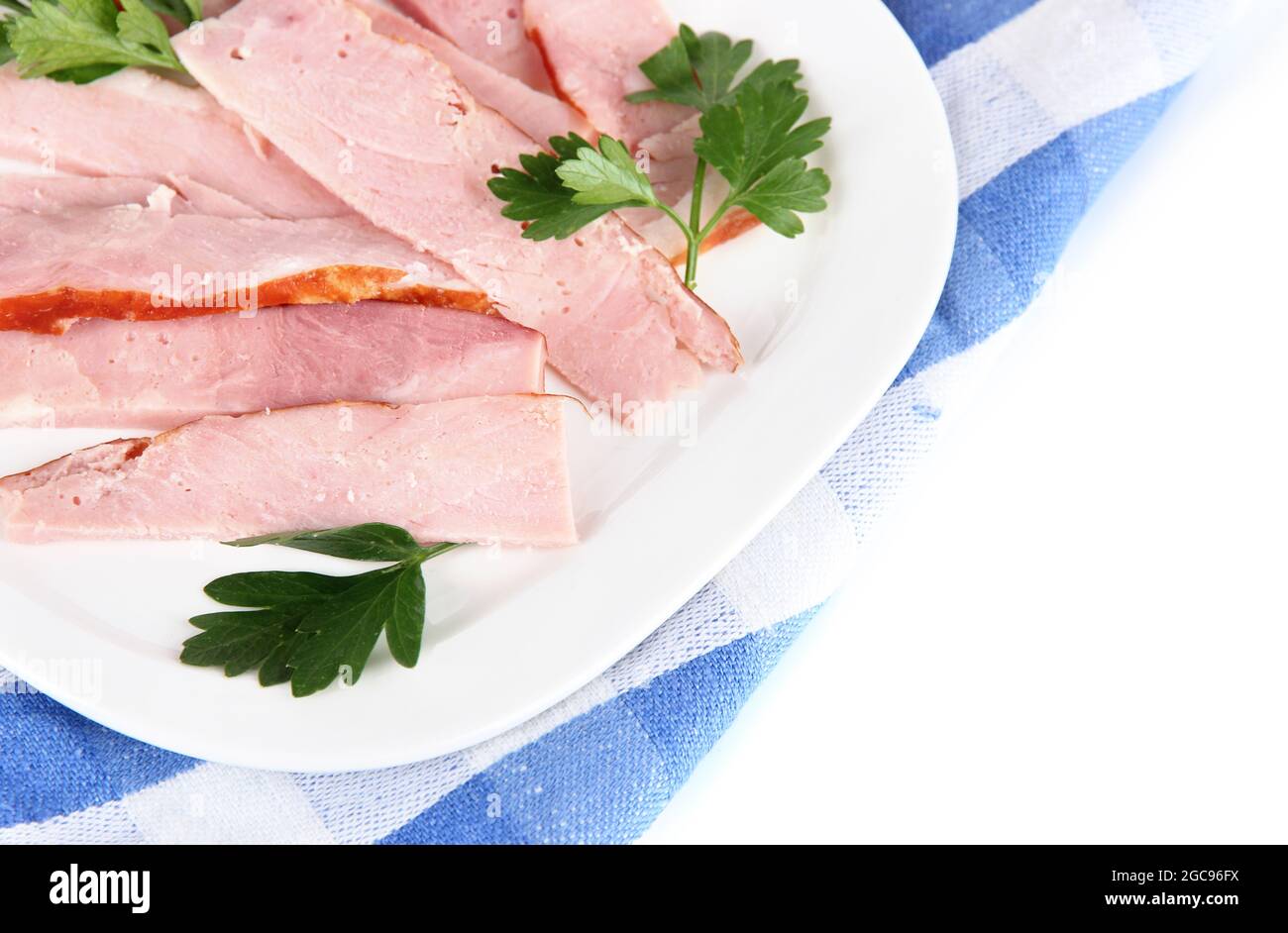 Bacon on plates on napkin isolated on white Stock Photo - Alamy