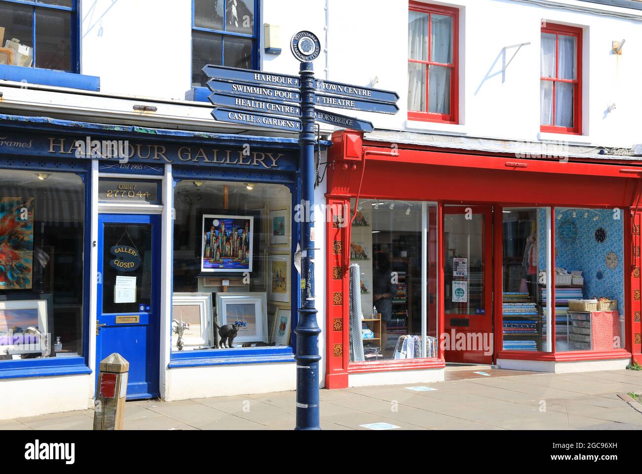 Cafes and shops on pretty Harbour Street, in coastal Whitstable, in ...