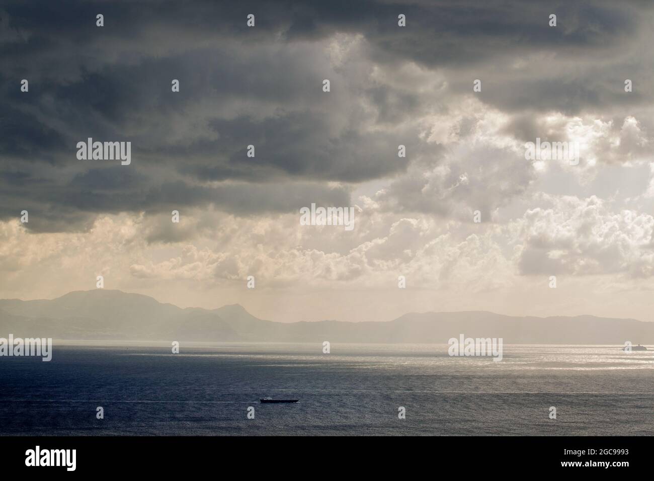 Amazing seascape in autumn variable weather in southern Italy, ships ...