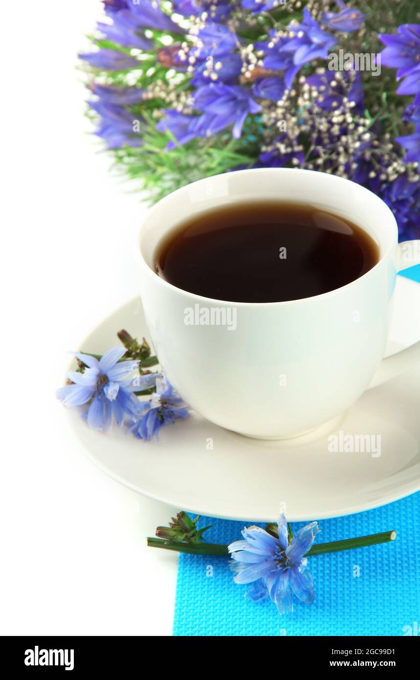 Cup of tea with chicory, isolated on white Stock Photo - Alamy
