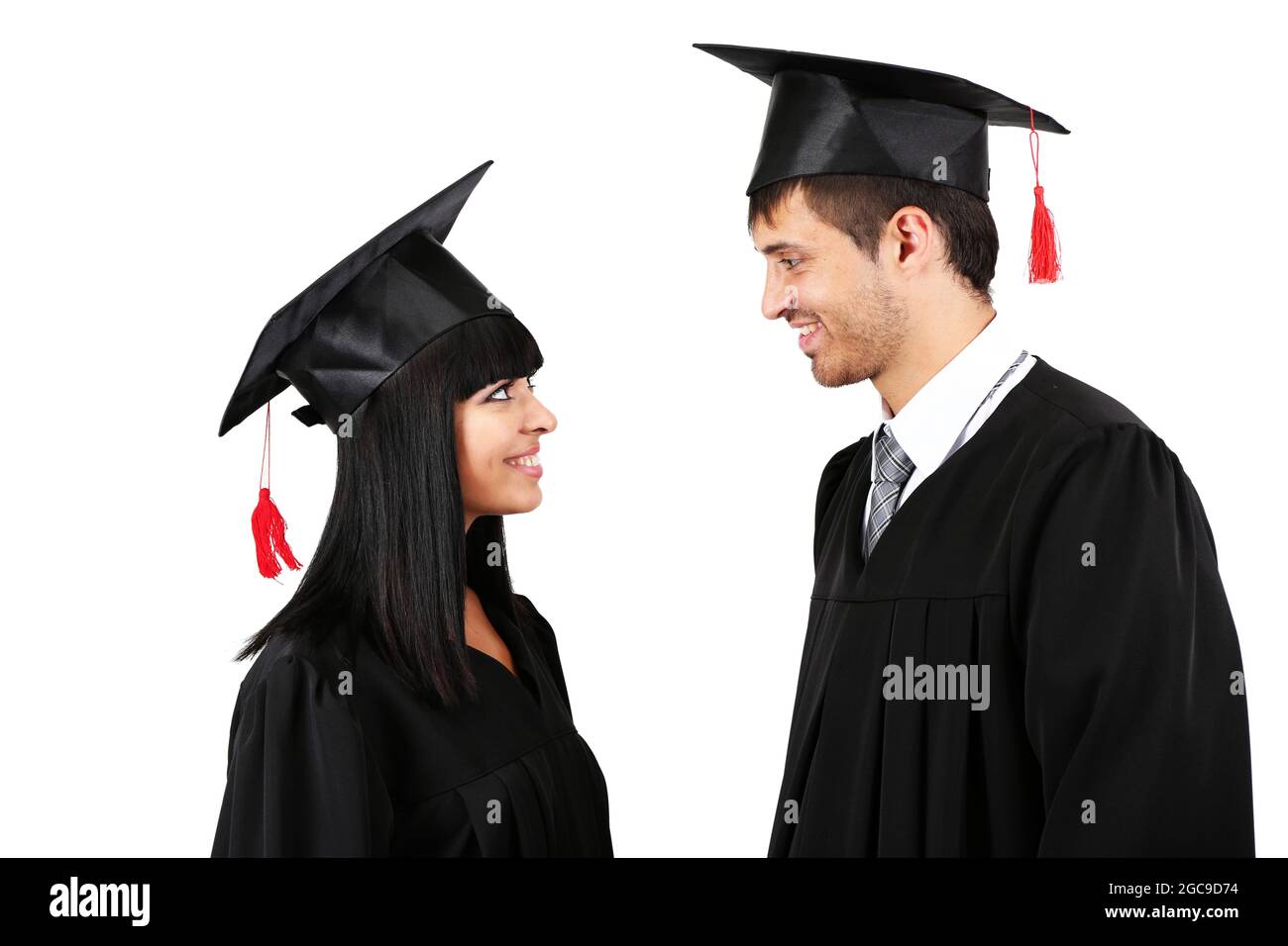 Two happy graduating students isolated on white Stock Photo - Alamy