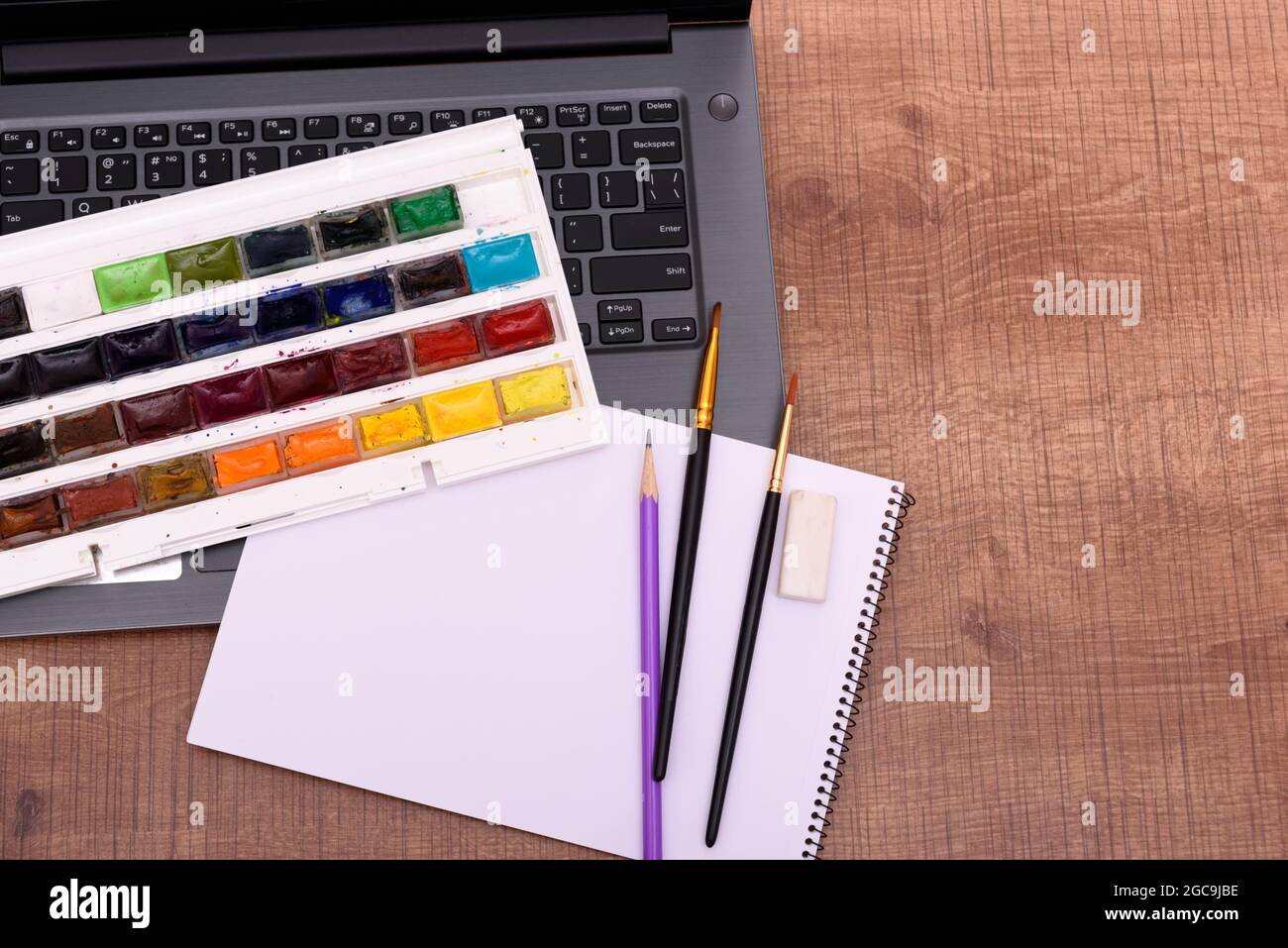 Online drawing class cover concept with laptop, sheet of paper, paints ...