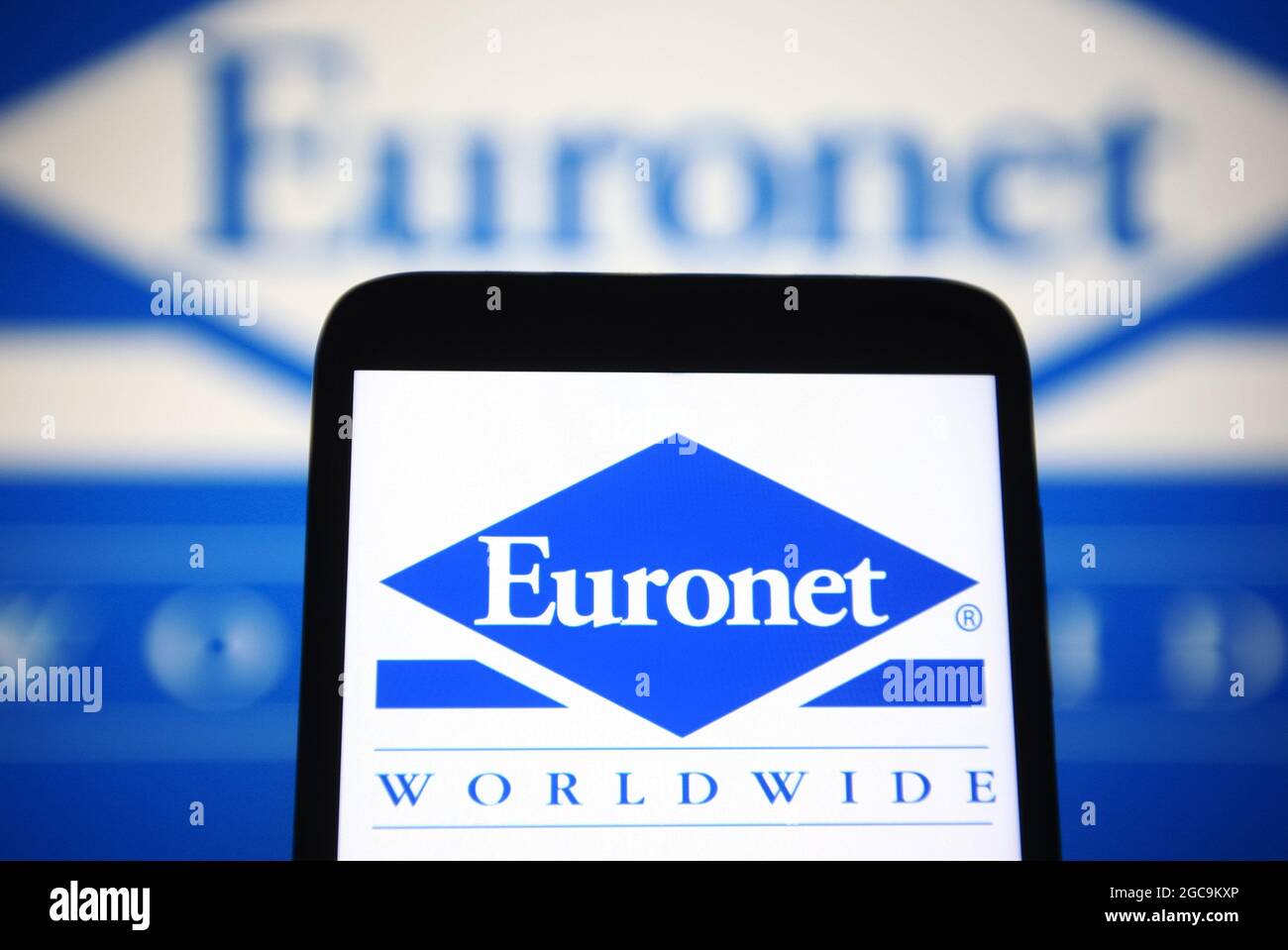 In this photo illustration an Euronet Worldwide logo is seen on a ...