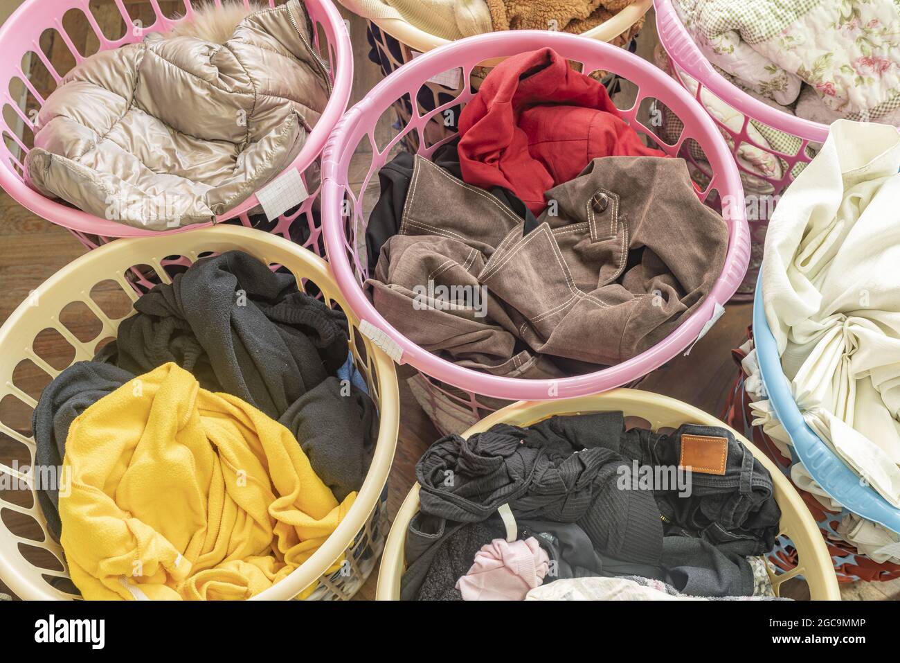 Top view of baskets with clothes from a laundry Stock Photo - Alamy