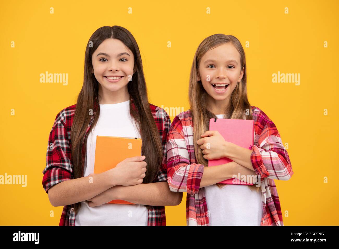 cheerful kids going to do homework with books. smiling teenager student ...