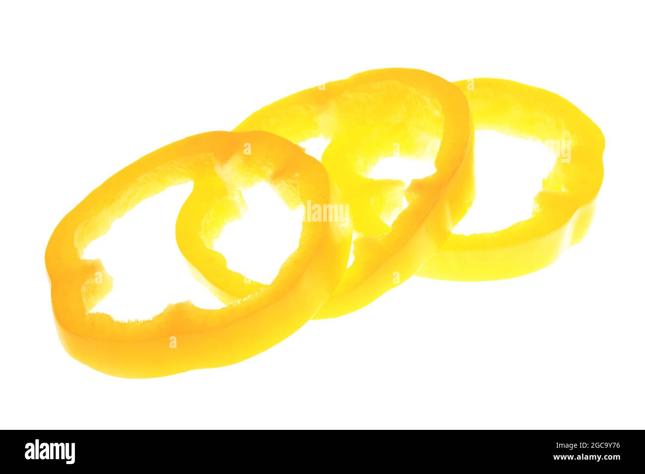 Fresh yellow pepper slices isolated on white Stock Photo - Alamy