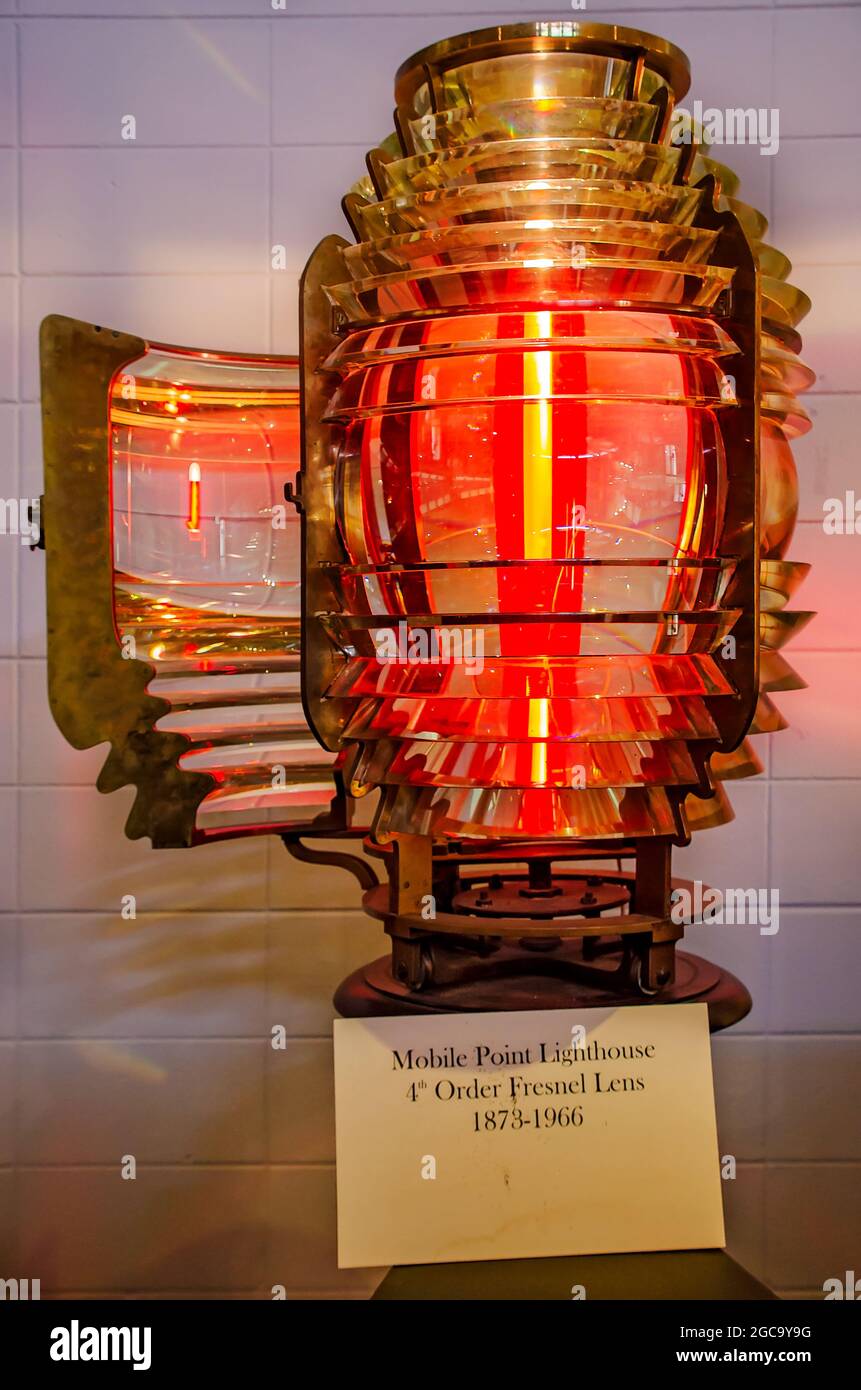 A Fourth Order Fresnel lens from Mobile Point Lighthouse is displayed ...