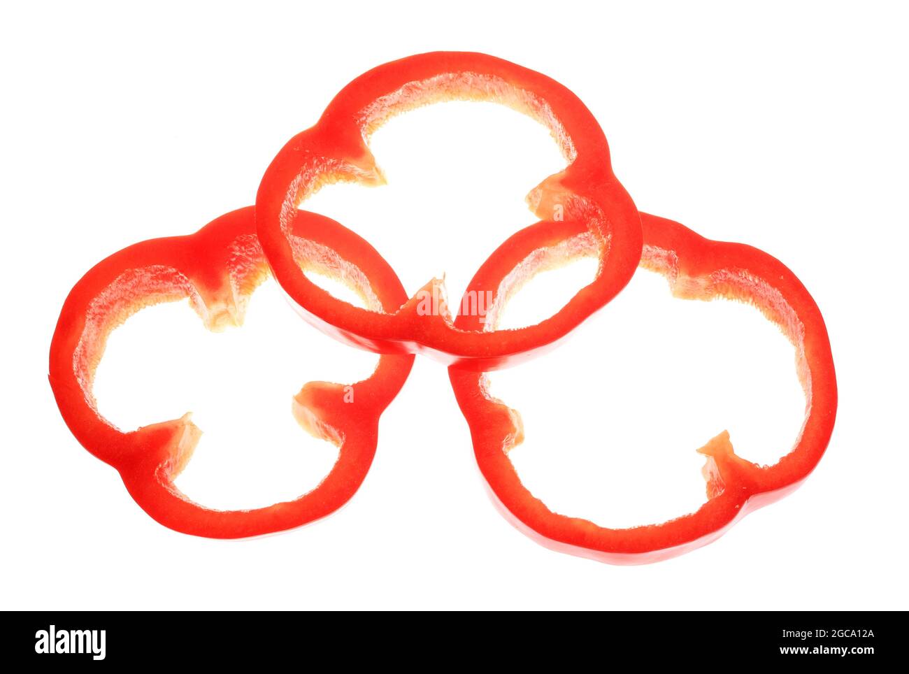 Fresh red pepper slices isolated on white Stock Photo - Alamy