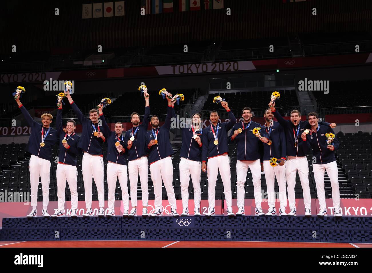 Team France (FRA) celebrates winning gold on the podium in the ...