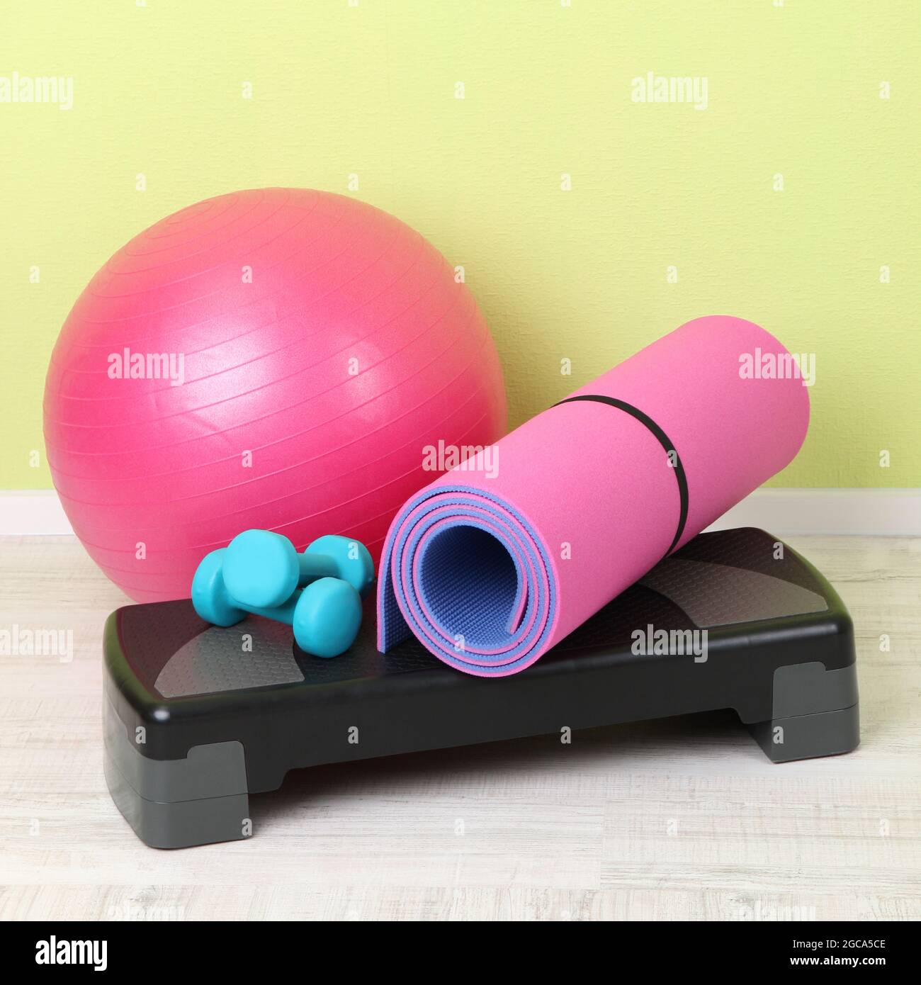 Different tools for fitness in room Stock Photo - Alamy