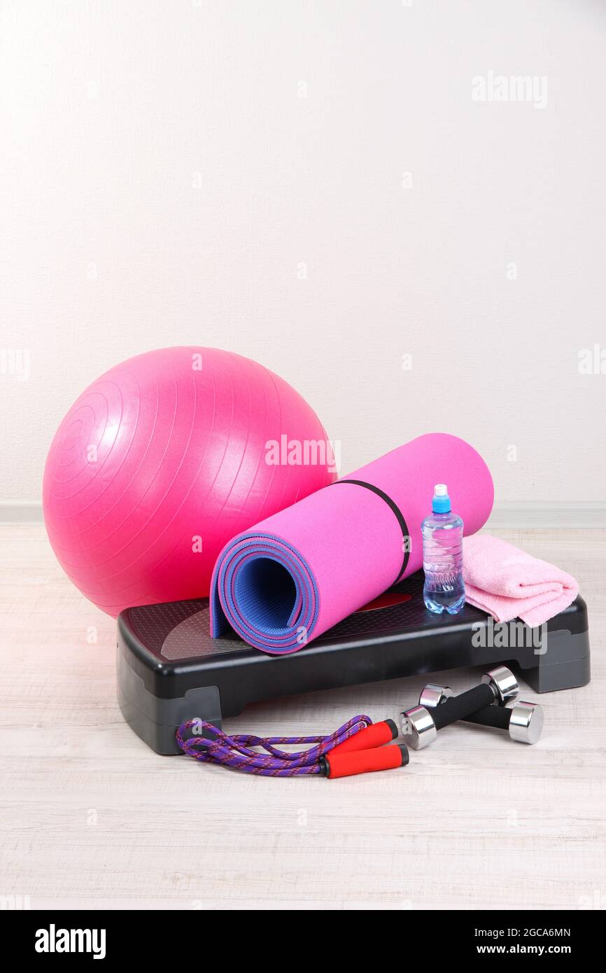 Different tools for fitness in room Stock Photo - Alamy