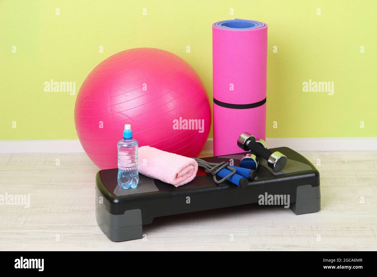 Different tools for fitness in room Stock Photo - Alamy