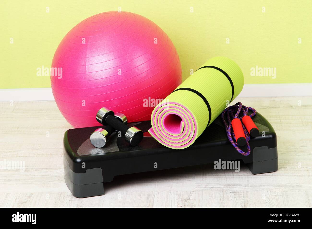 Different tools for fitness in room Stock Photo - Alamy
