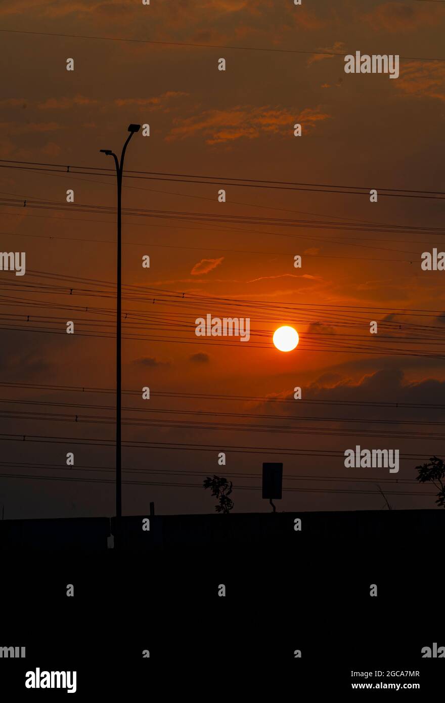 Messy wires sky sunset background Stock Photo - Alamy