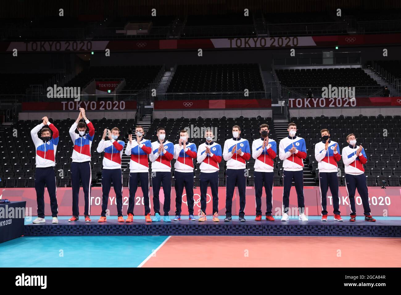 Silver medalists, Team ROC (ROC), celebrate on the podium in the ...