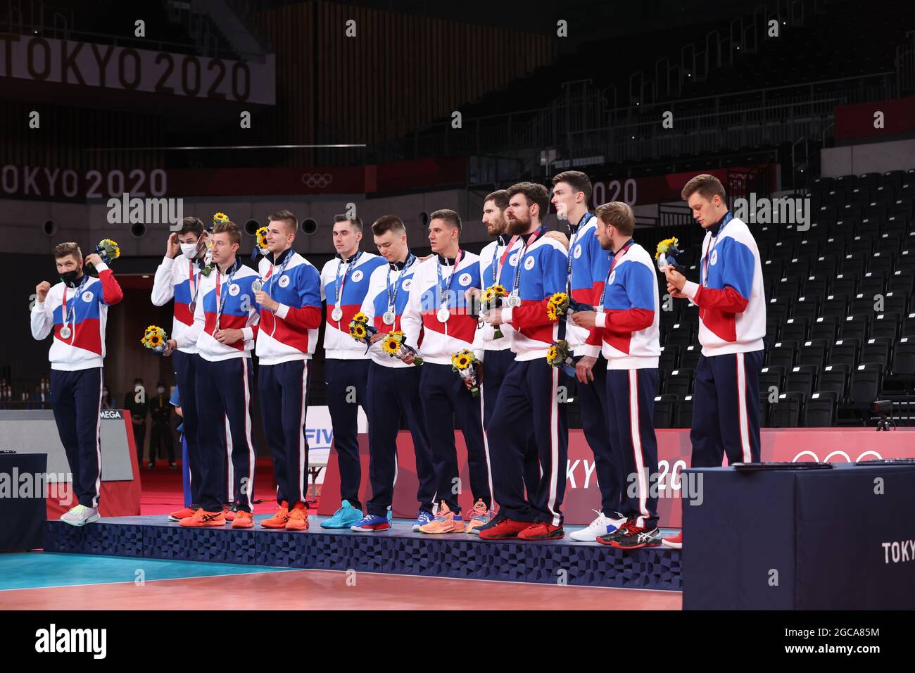 Silver medalists, Team ROC (ROC), celebrate on the podium in the ...